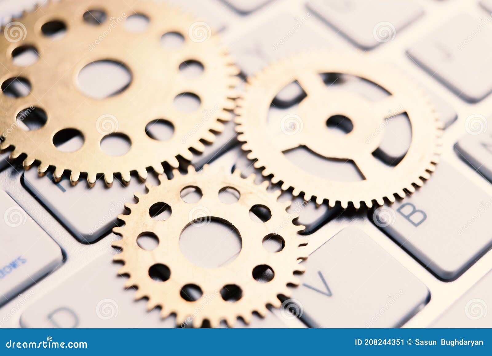 Metal Gear Wheels on a Computer Keyboard Stock Image - Image of wheels ...