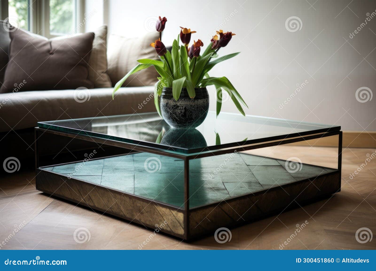 A Metal and Glass Coffee Table with a Vase on Top Stock Photo - Image ...
