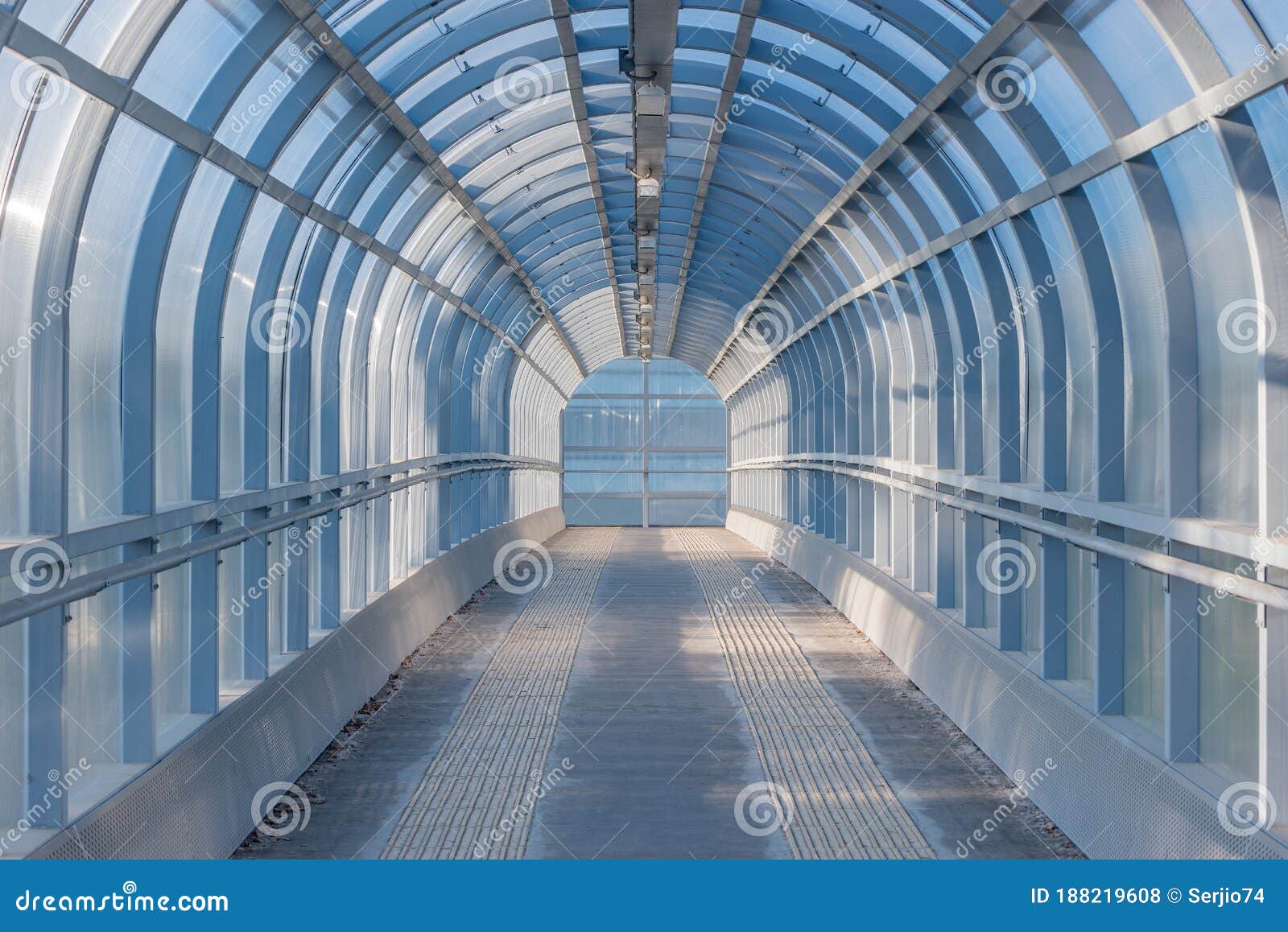 Metal and glass corridor. stock photo. Image of empty - 188219608