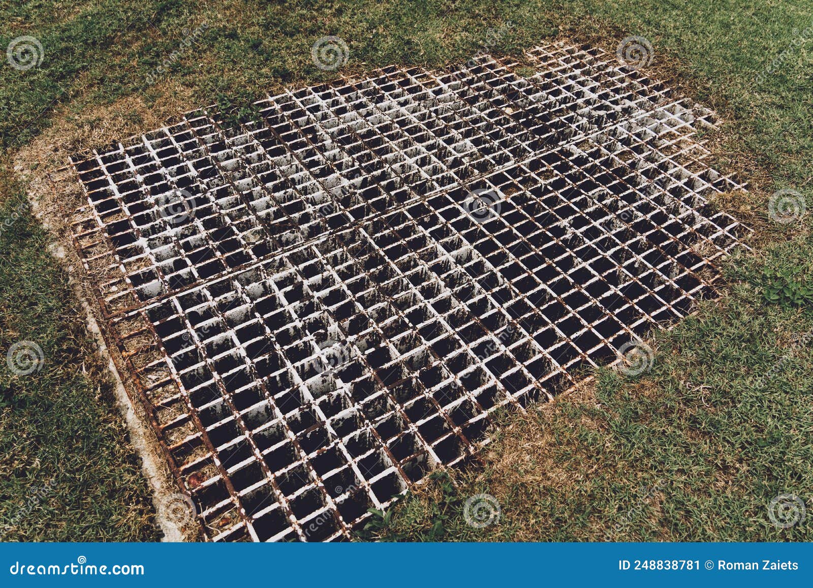 Metal Grating on Drainage Systems in the Grass Garden Stock Image ...