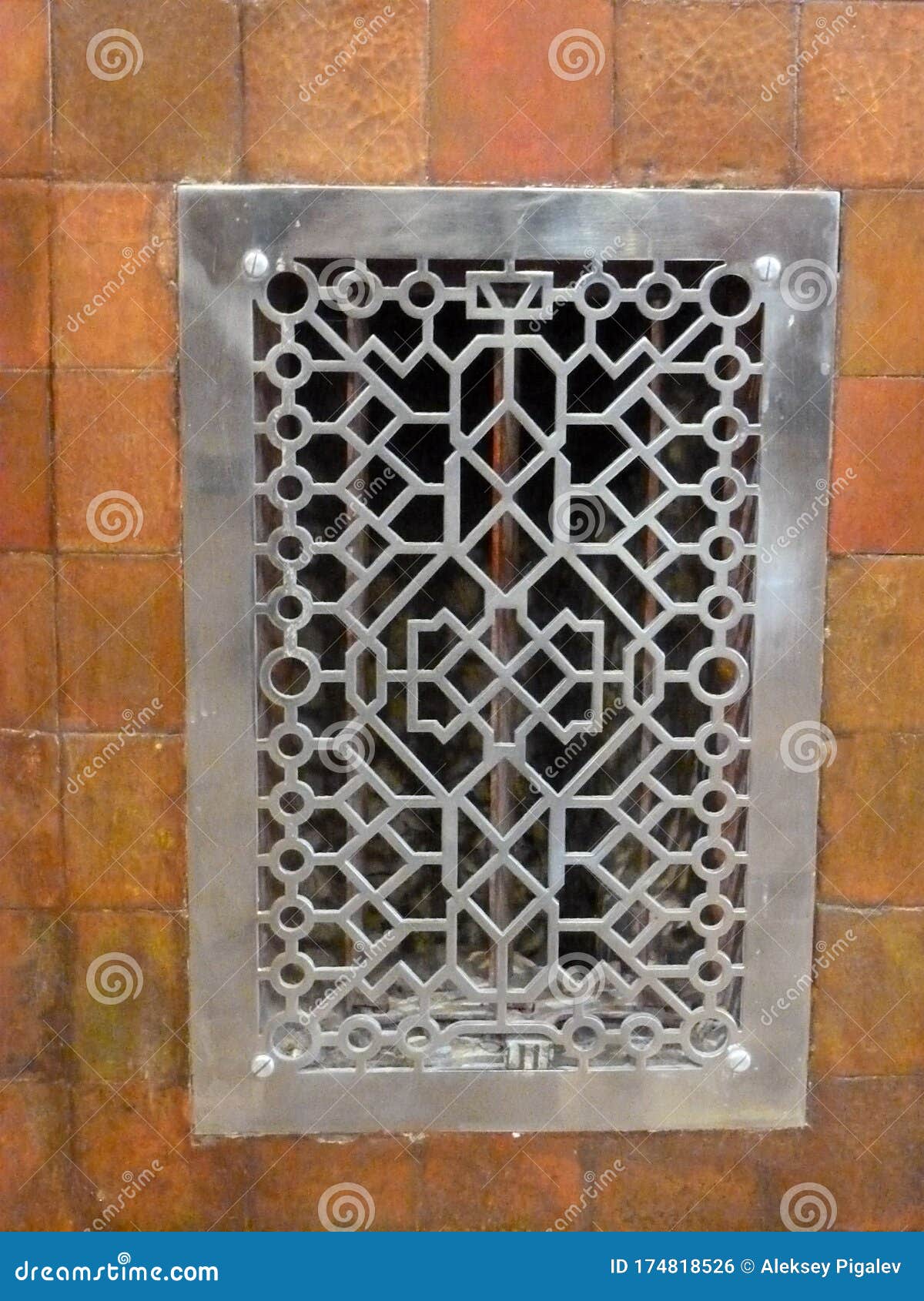 Metal Grating with Patterns on the Wall of the House Stock Photo ...