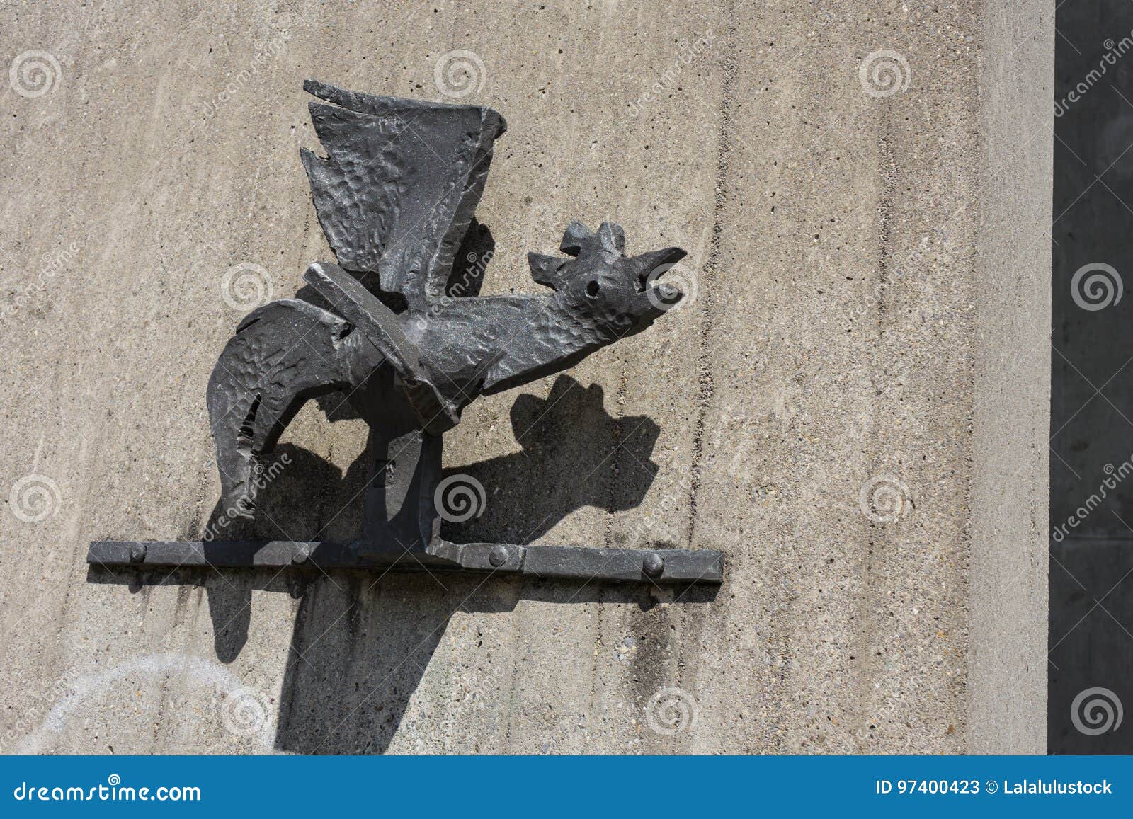 Metal Griffin Sculpture Mounted on a Wall Stock Image - Image of ...