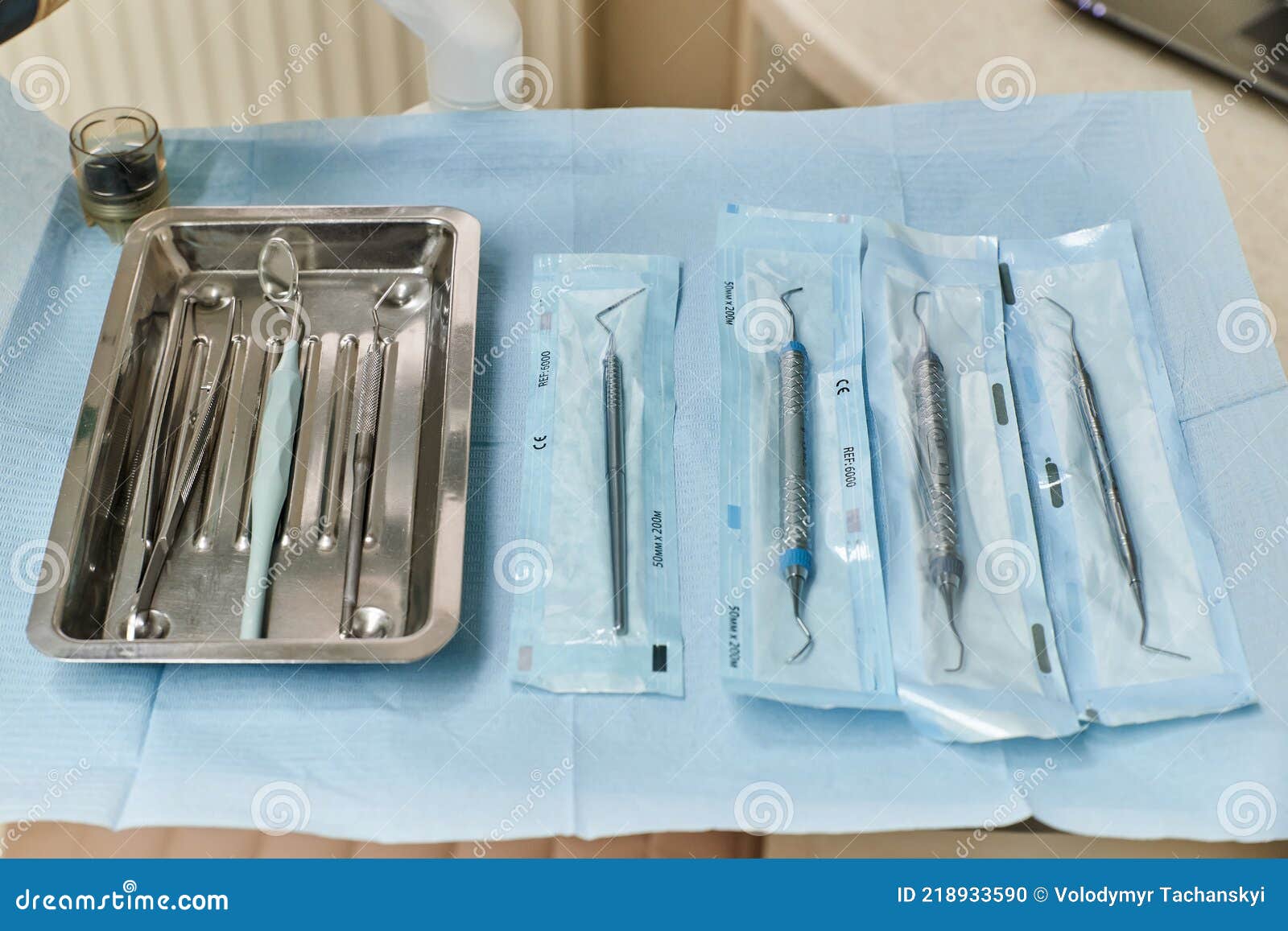 Metal Instruments For Dental Treatment On The Table Of The Dental ...