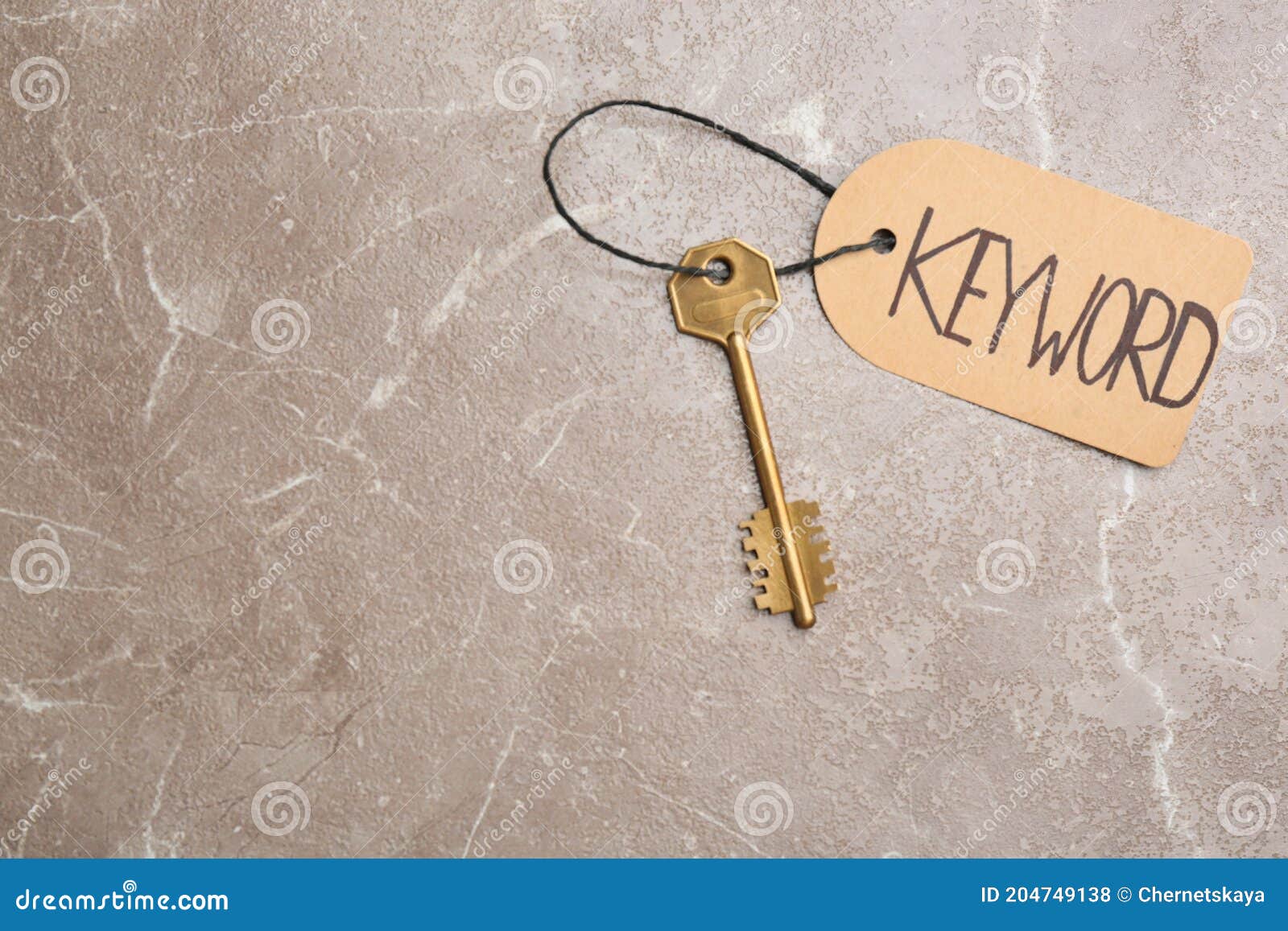 Metal Key and Tag with Word KEYWORD on Grey Table, Top View. Space for ...
