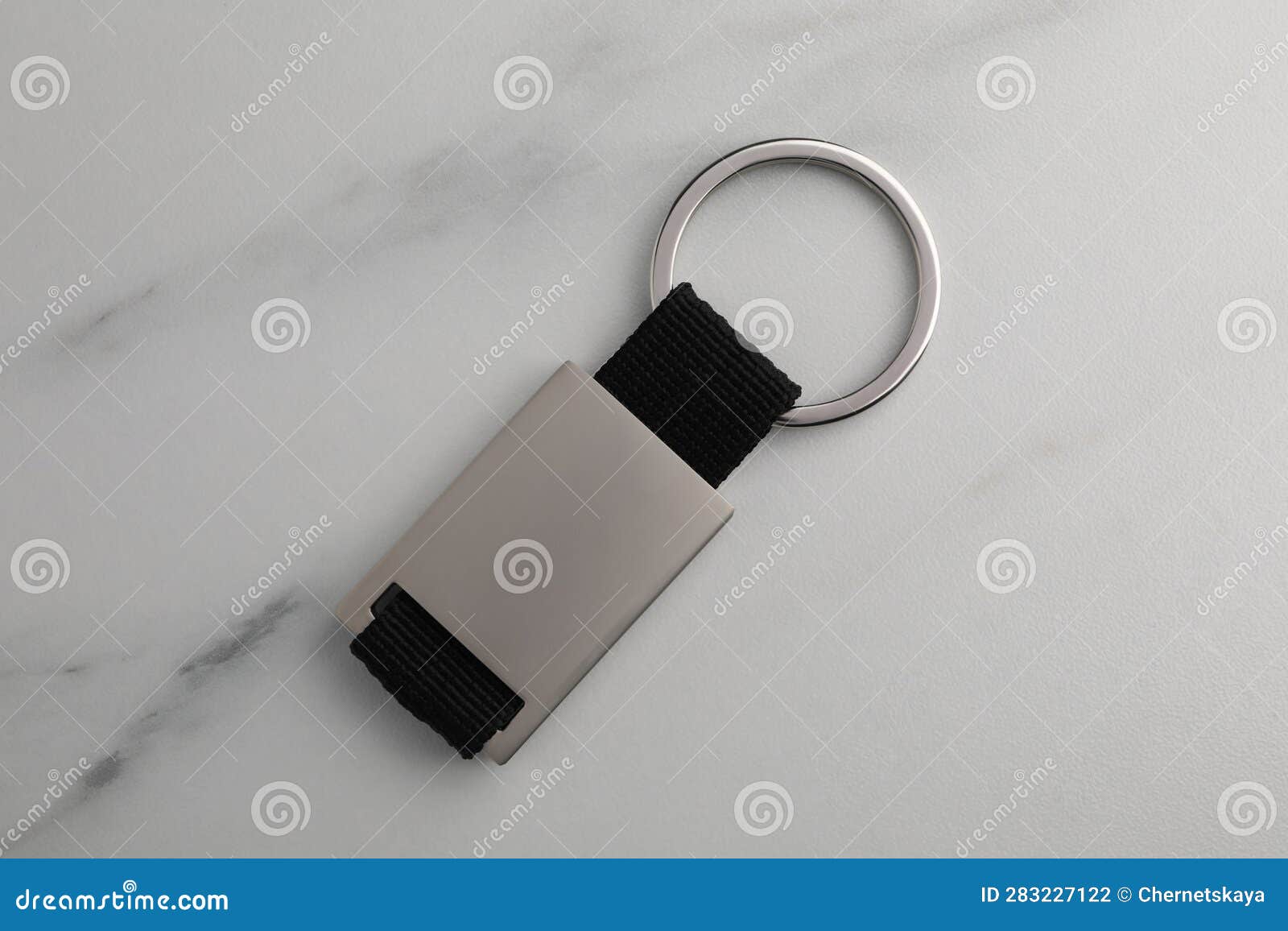 Metal Keychain on White Table, Top View Stock Photo - Image of style ...
