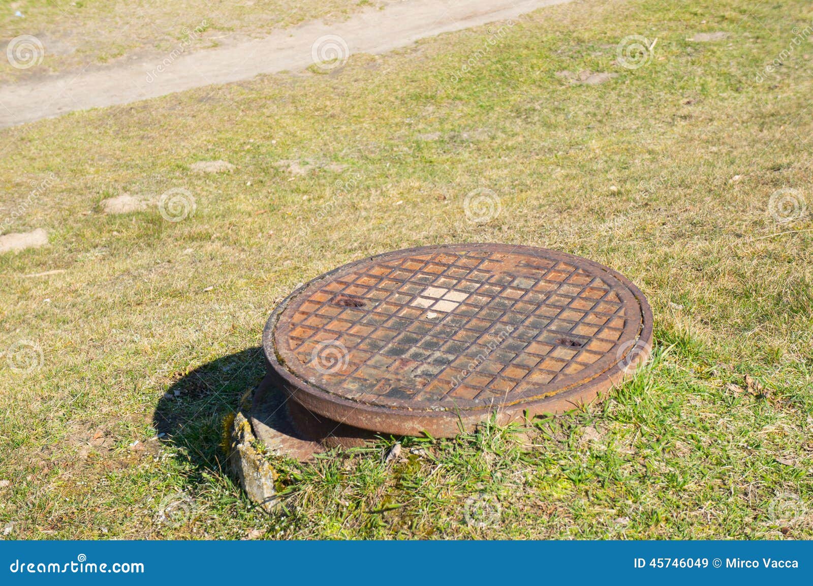Metal manhole stock image. Image of grass, plants, metal - 45746049