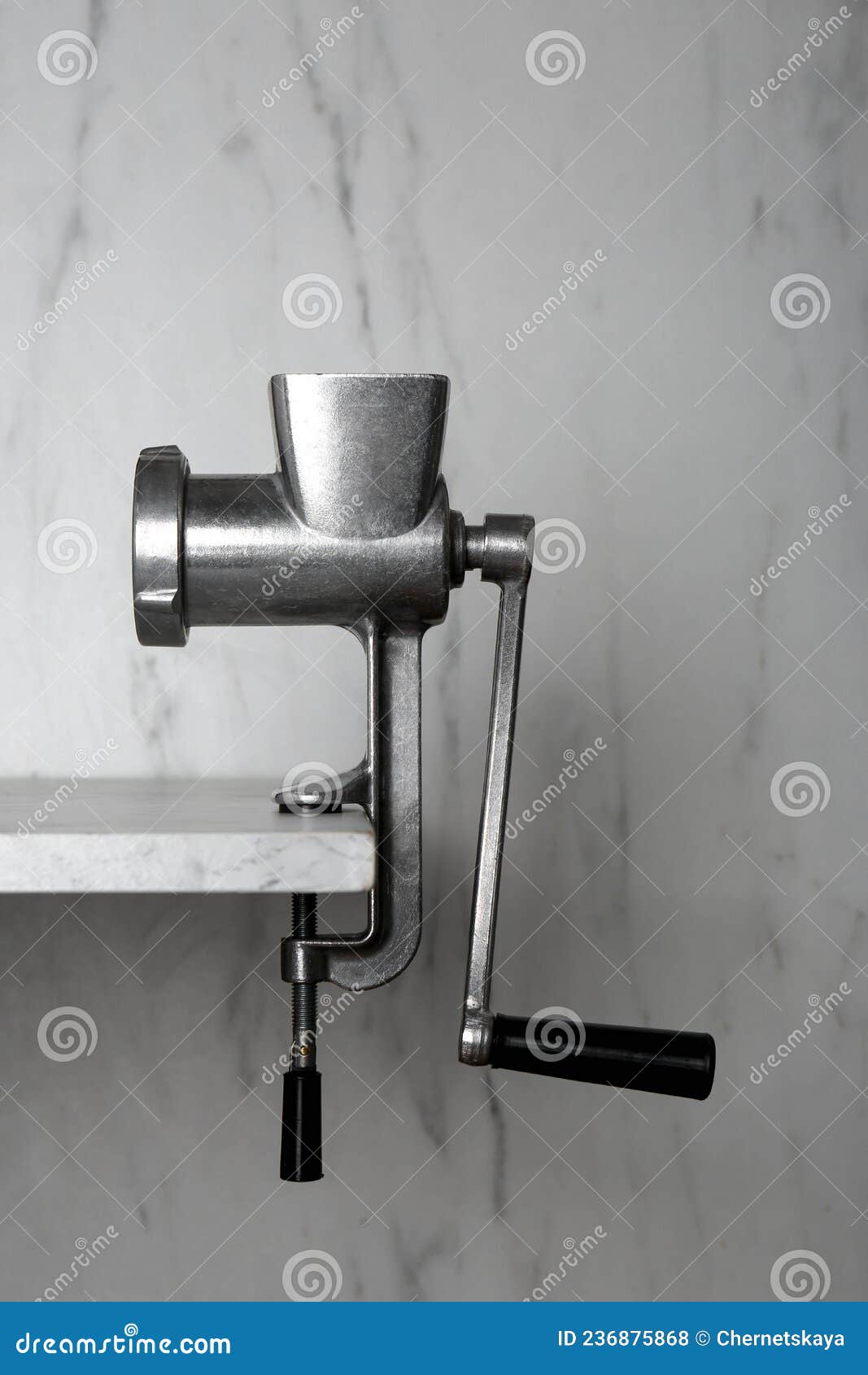 Metal Manual Meat Grinder on Table Against White Marble Background ...
