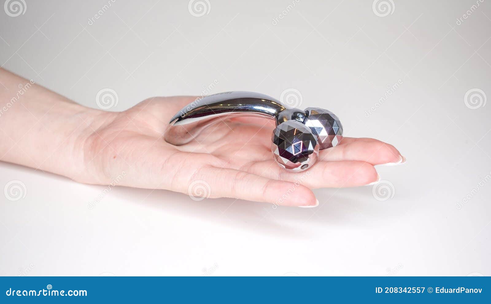 Metal massager for face stock image. Image of human - 208342557