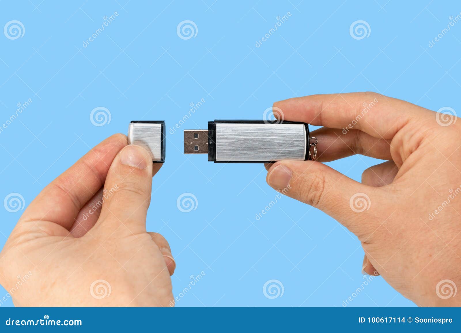 Metal Memory Stick on Hand with Blue Background Stock Photo - Image of ...