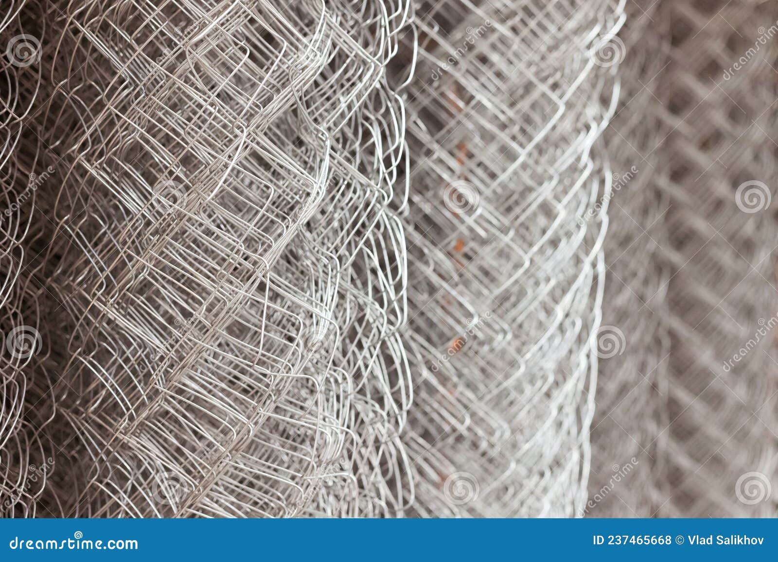 Metal Mesh Netting Rolled into Rolls. Rolled Chain-link Fence. Stock ...