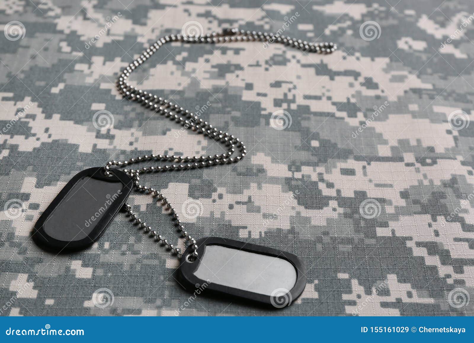 Metal Military ID Tags on Camouflage Background Stock Image - Image of ...