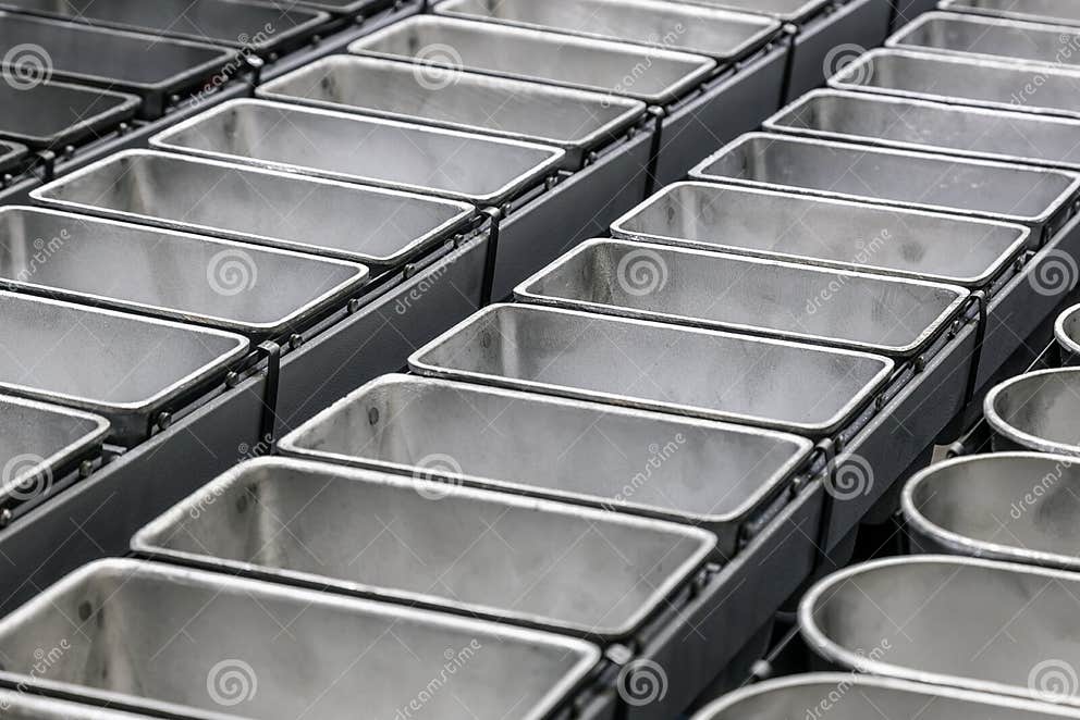Metal Molds on the Conveyor for Baking Bread Stock Photo - Image of ...