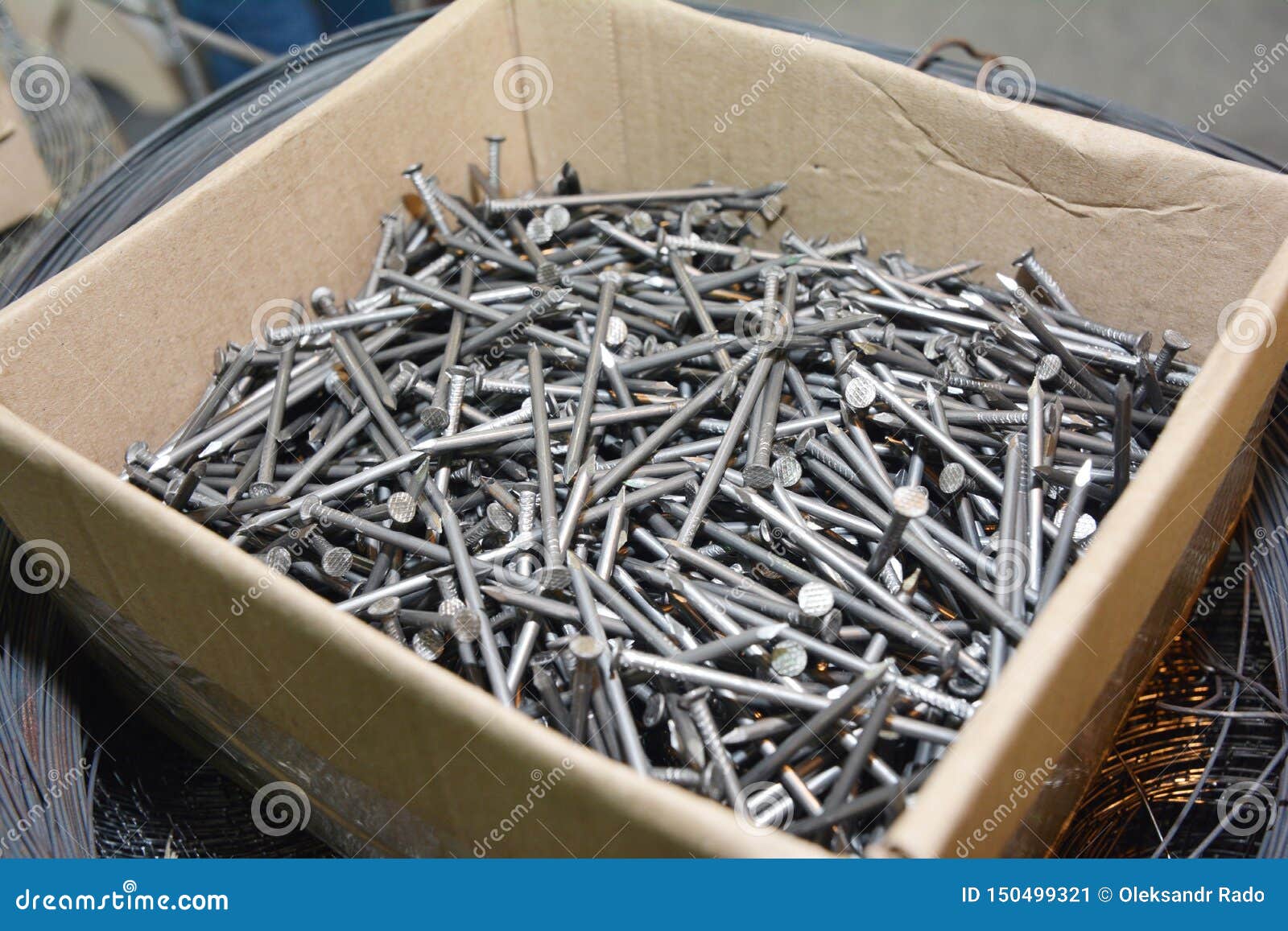 Metal nails in the box stock image. Image of building - 150499321