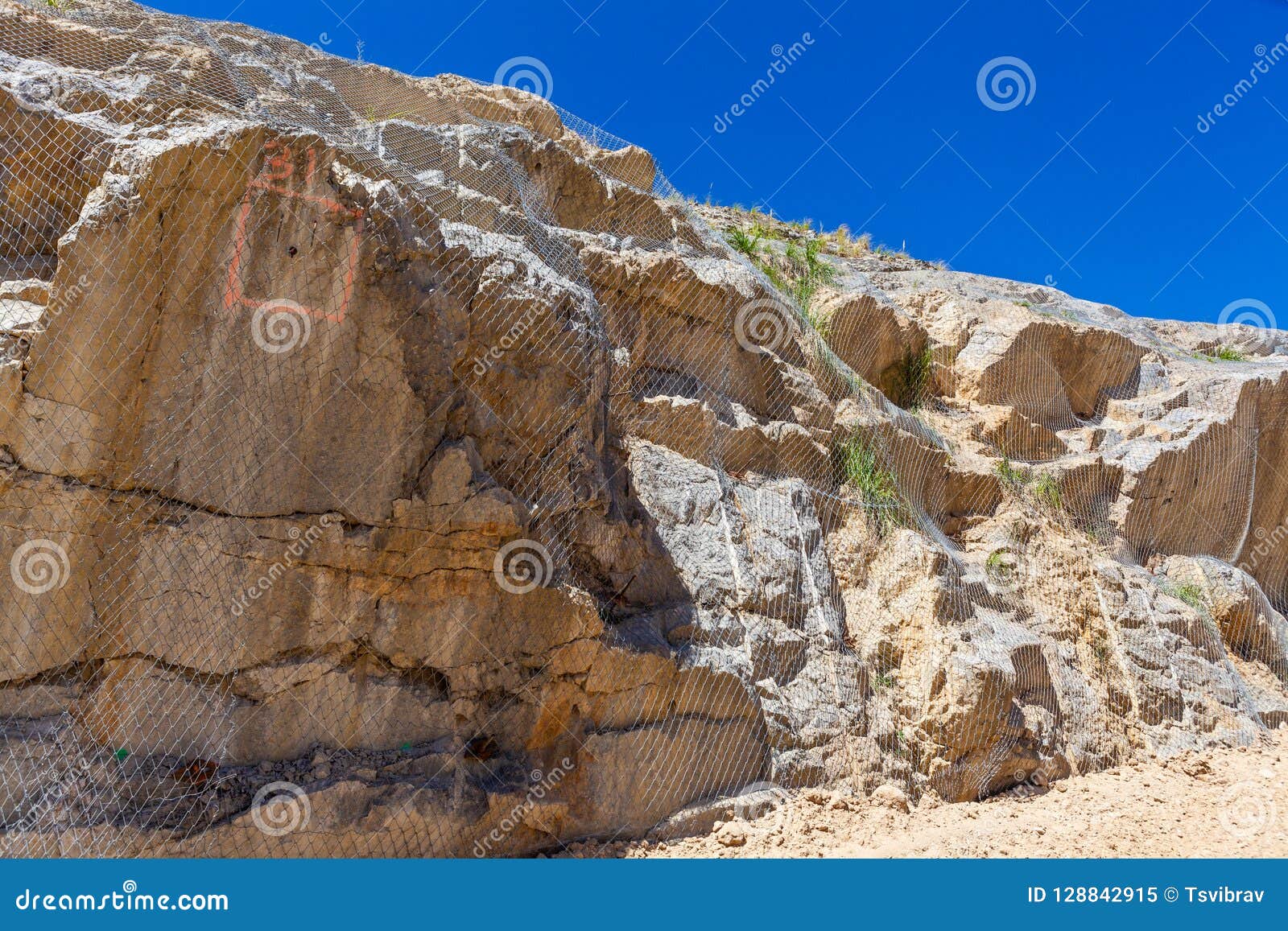 Metal Net Protecting Rocks from Falling Down. Stock Image - Image of ...