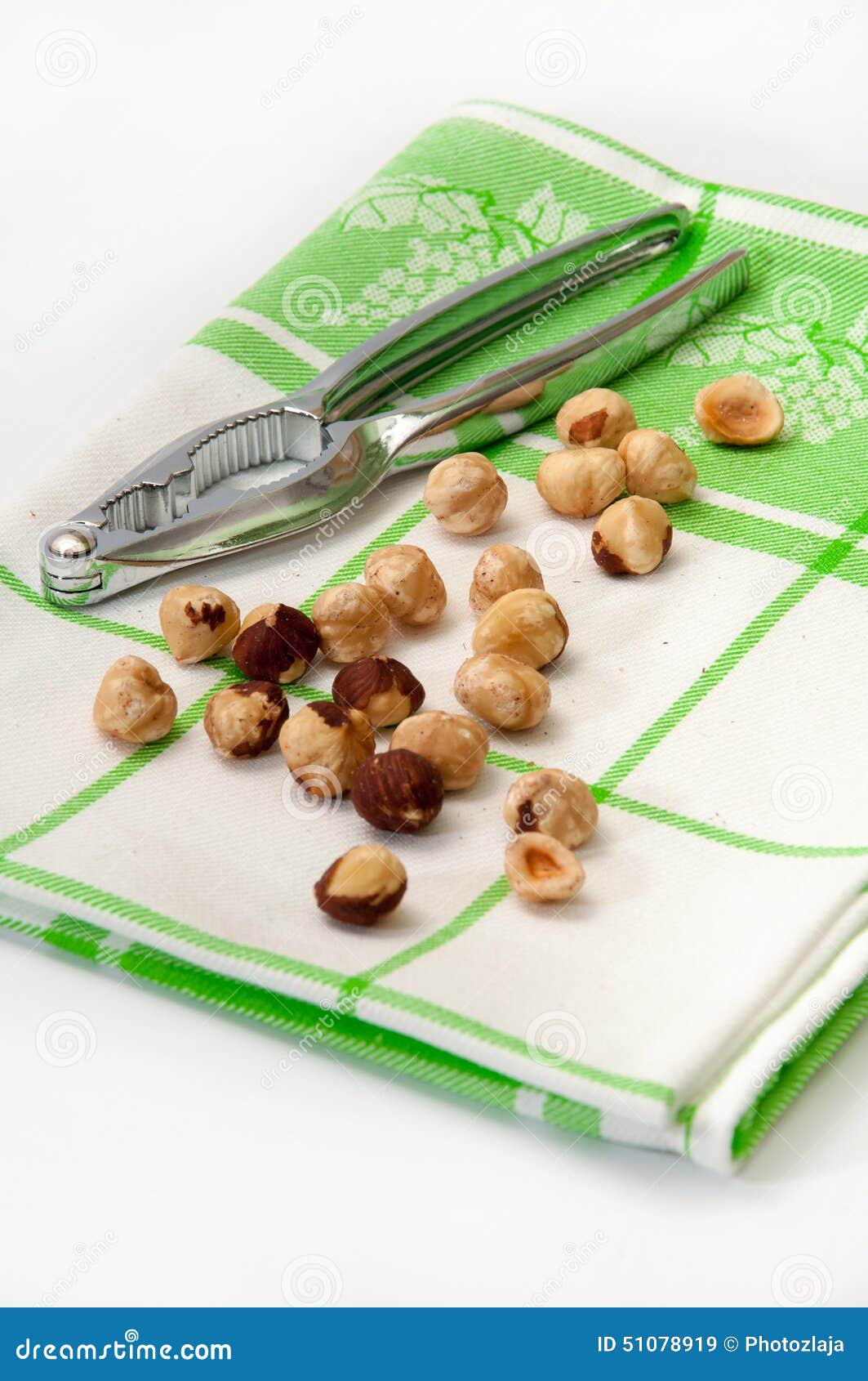 Metal Nutcracker on a Green Rag with Nuts Stock Image - Image of ...