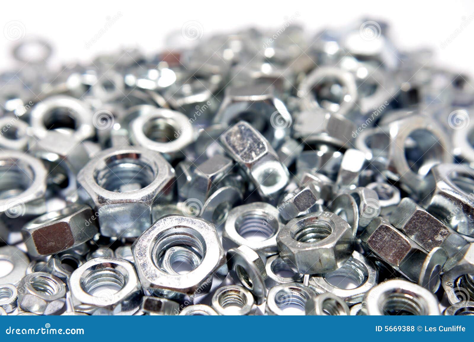 Metal Nuts On White Background Laid Out In The Shape Of Heart Stock ...