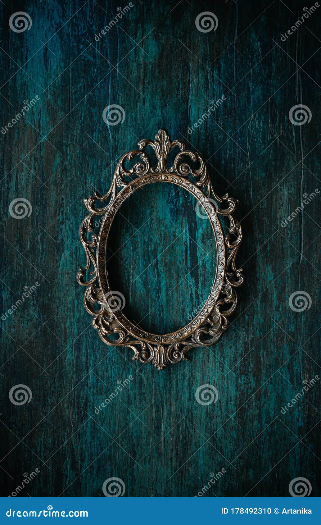 Metal oval frame on a wall stock photo. Image of decorative - 178492310