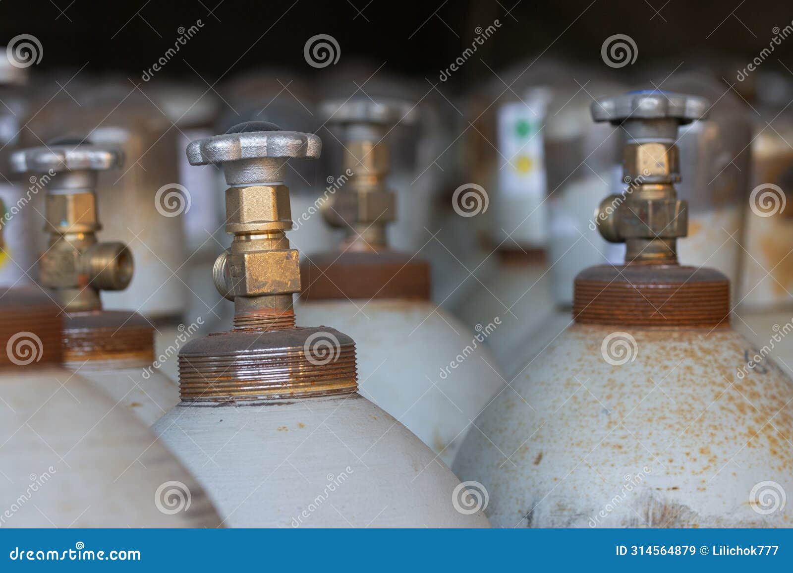 Metal Oxygen Cylinders on a Wall Background Stock Image - Image of ...