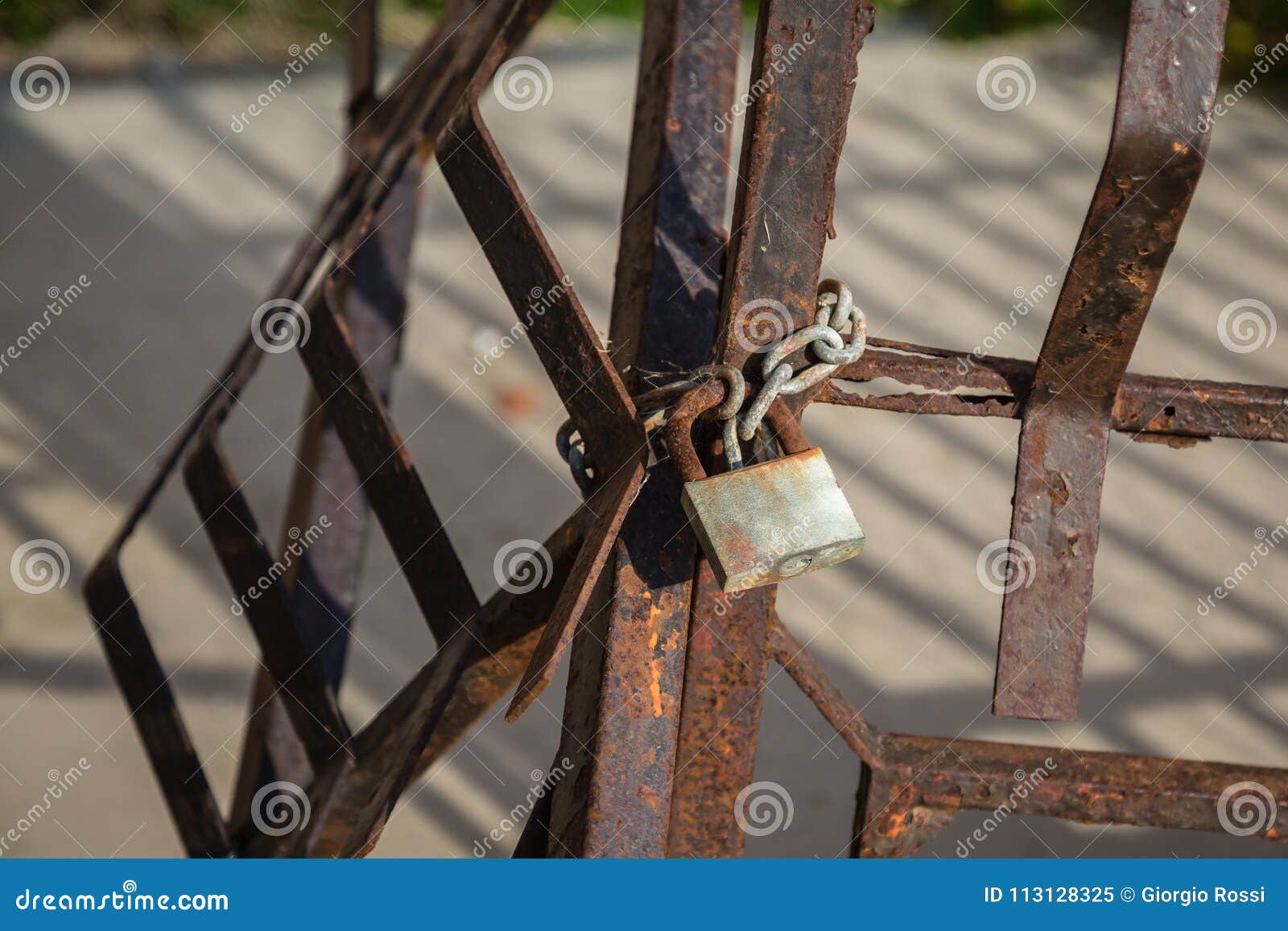Metal Padlock and Chain Attached To Rusty Railings Stock Image - Image ...