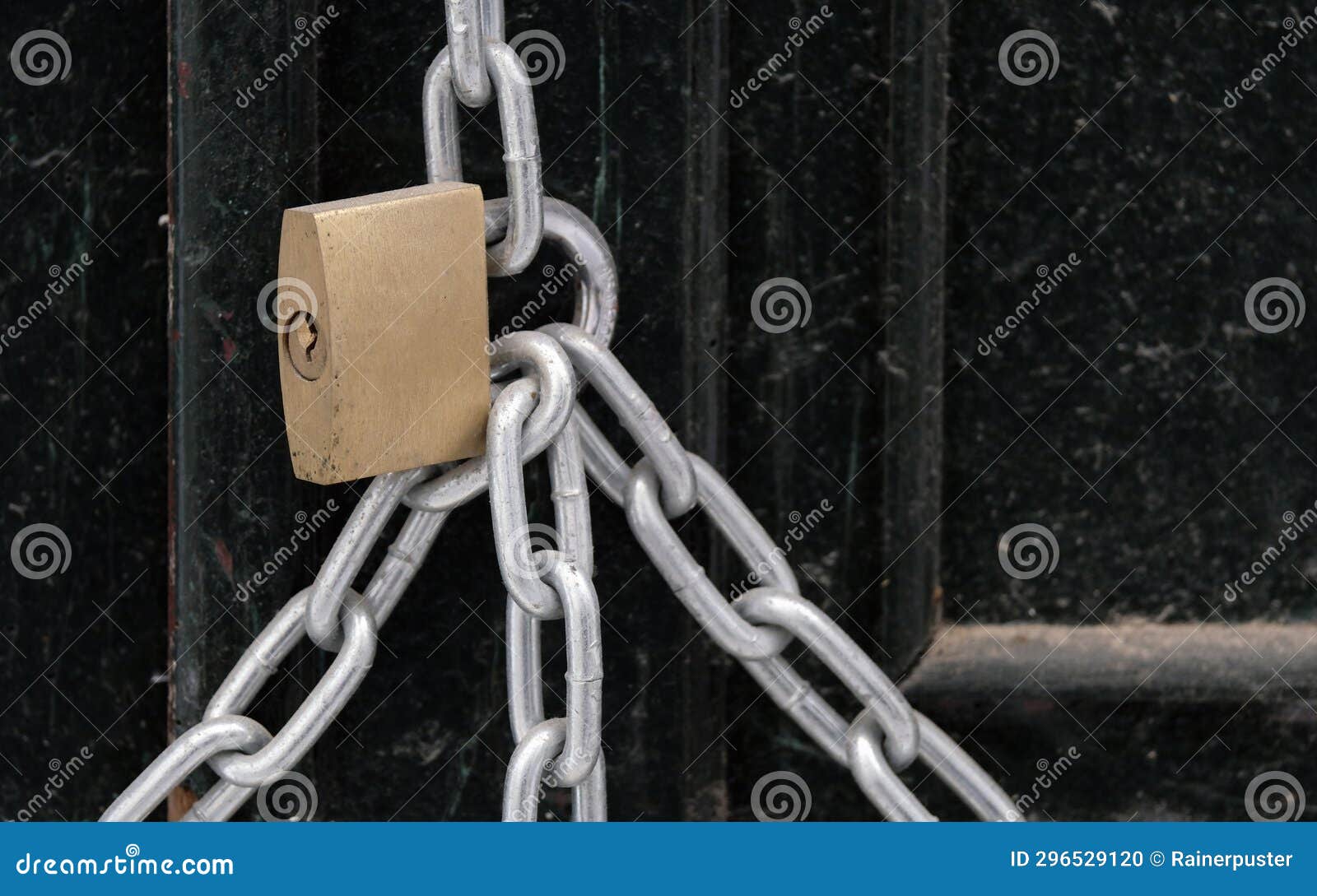 Metal Padlock Securing Chains on a Door Stock Photo - Image of safe ...