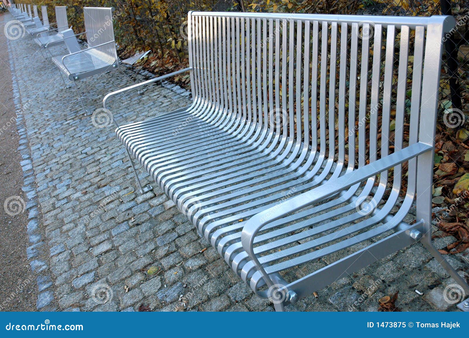 Metal park benches stock image. Image of angle, path, modern - 1473875