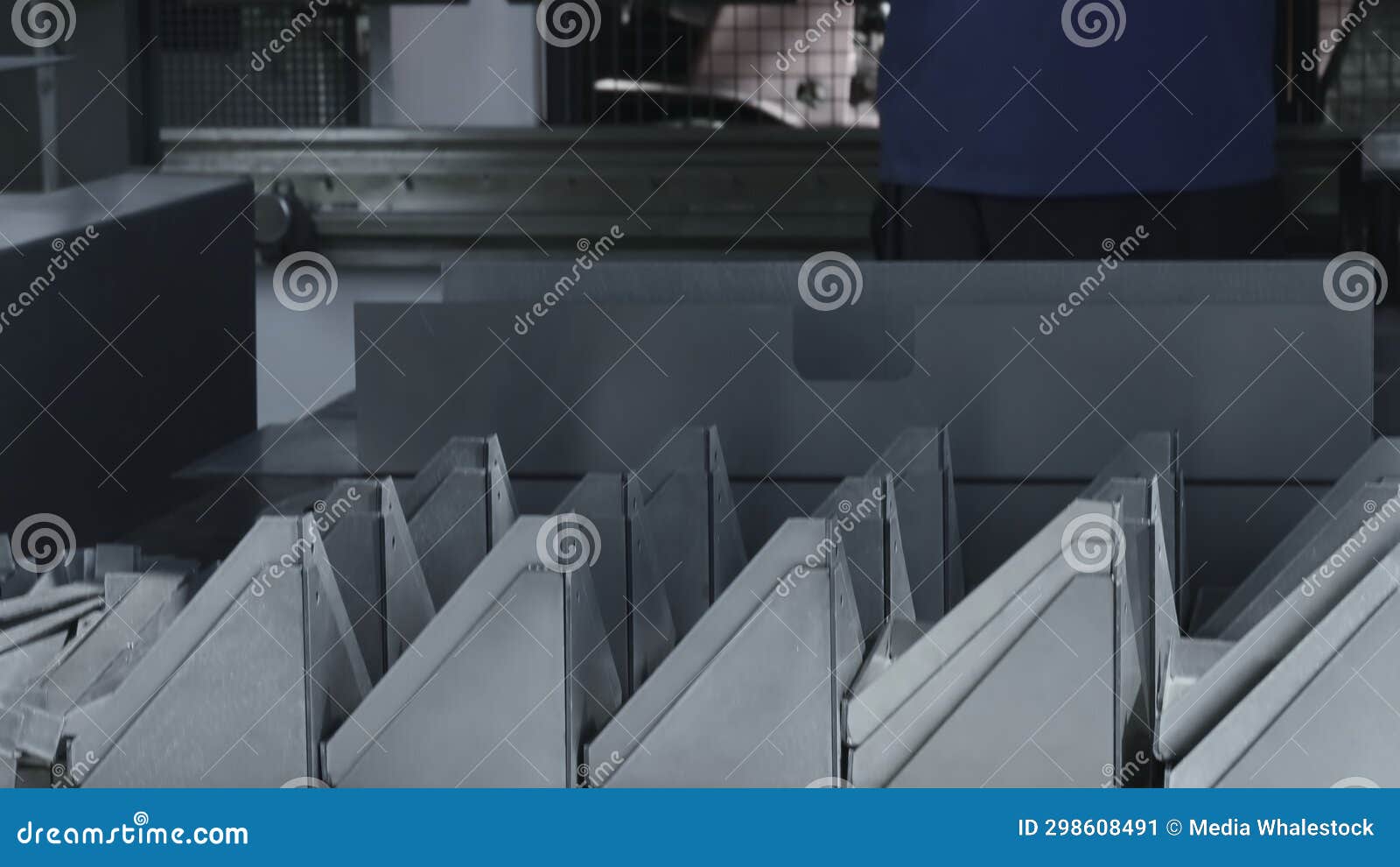Metal Parts on Factory Table with Working Assembler. Creative Stock ...