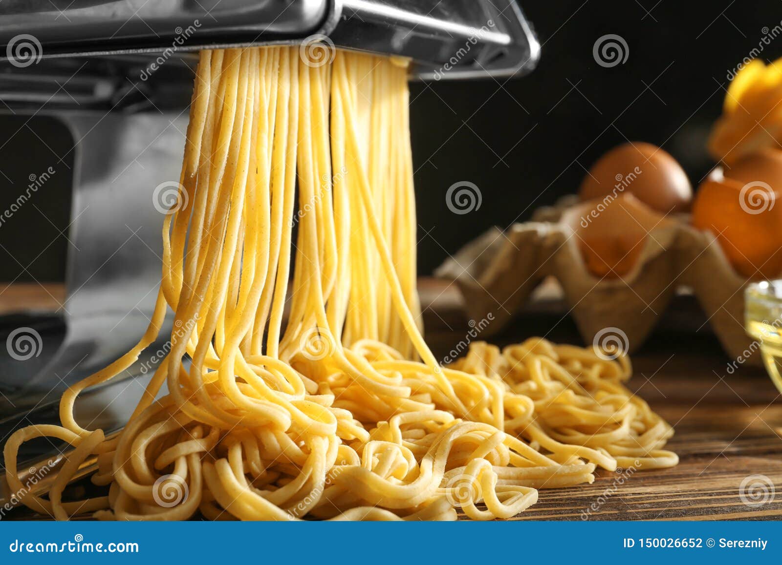 Metal Pasta Maker with Dough on Table, Closeup Stock Photo - Image of ...