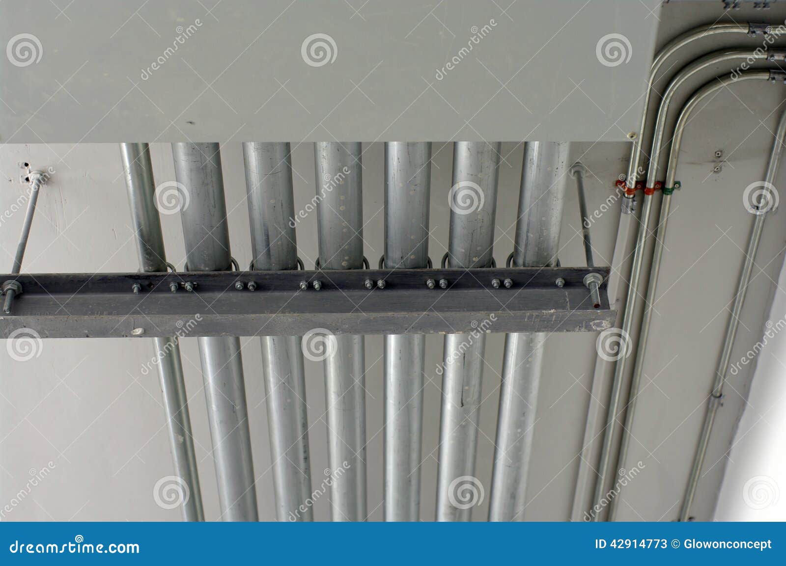 Metal pipes on the ceiling stock image. Image of background - 42914773