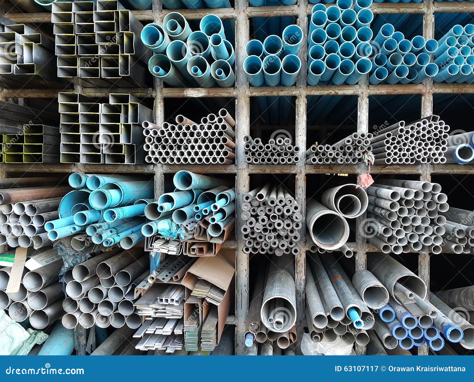 Metal Pipes and Pvc Pipes Stack on Shelf Stock Image - Image of pipe ...