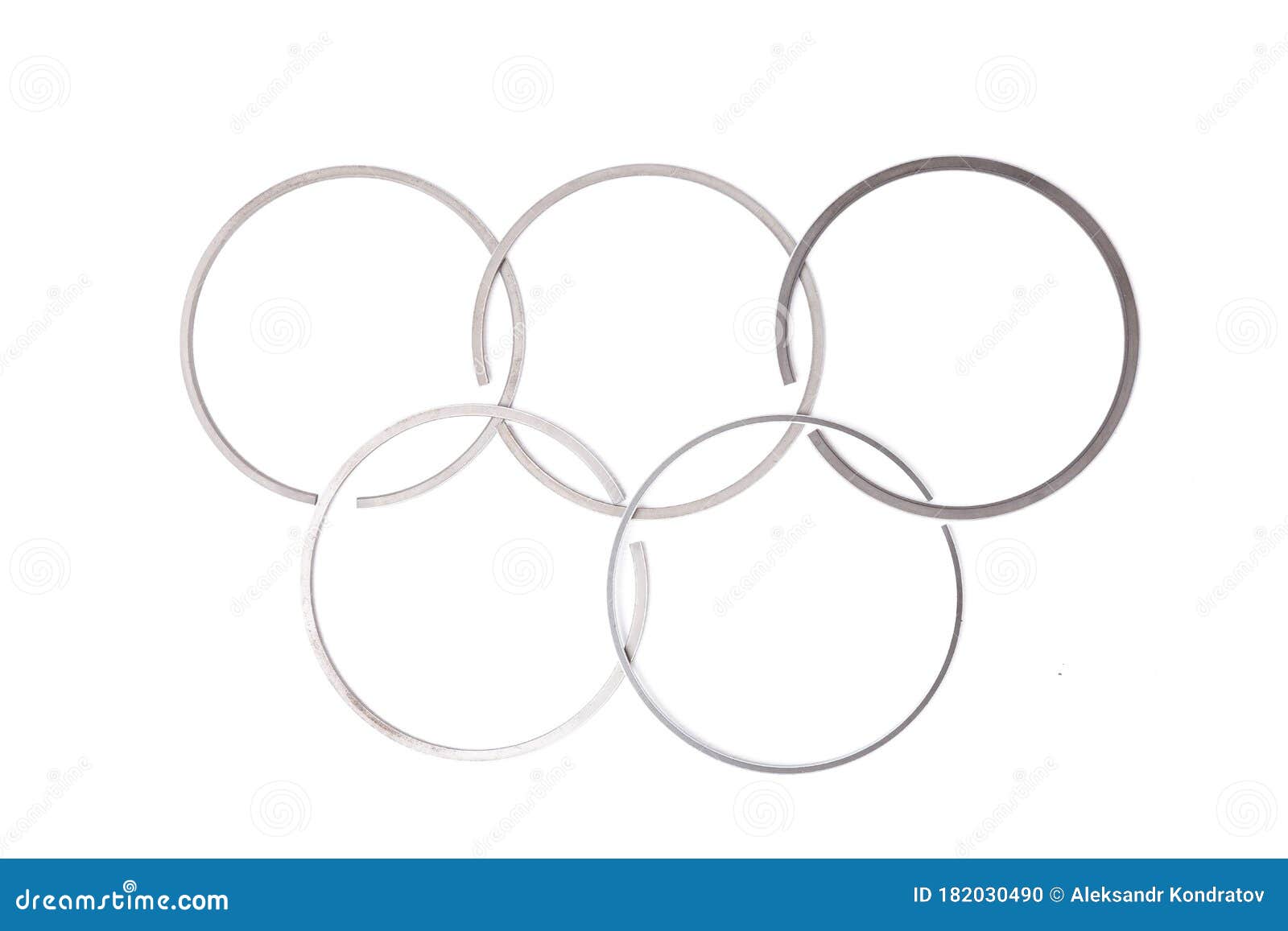 Metal Piston Rings of a Car Engine Placed on a White Background in the ...