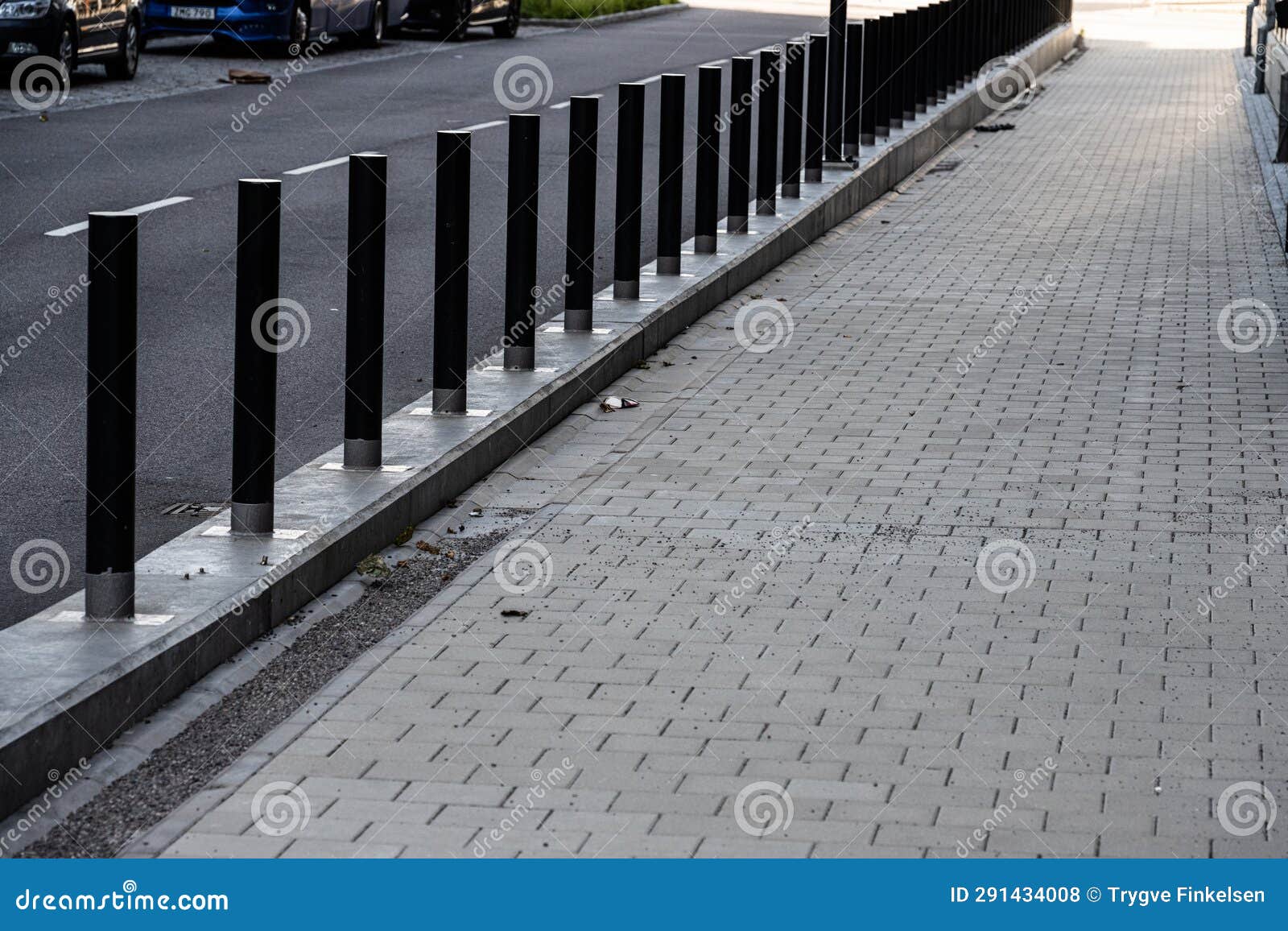 Metal Poles Protecting a Building and Sidewalk.. Stock Photo - Image of ...