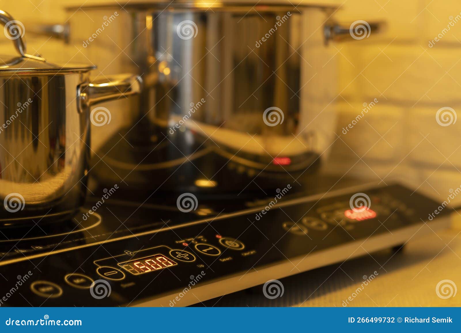 Metal Pot on Induction Hob in Modern Kitchen Stock Photo - Image of ...
