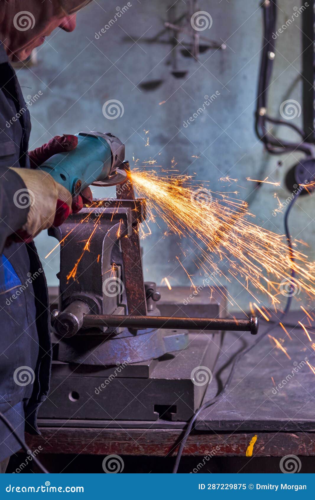 Metal Processing. Man Fitter in Protective Gloves and Uniform with ...