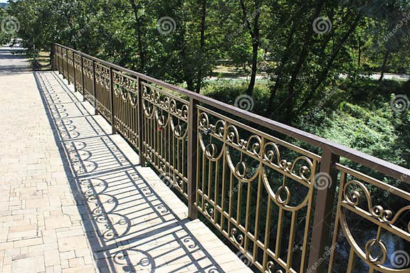 Metal Railing of Bridge and Its Shadow Stock Image - Image of guard ...