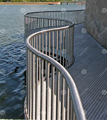 Metal railing by the water stock image. Image of handrail - 591741
