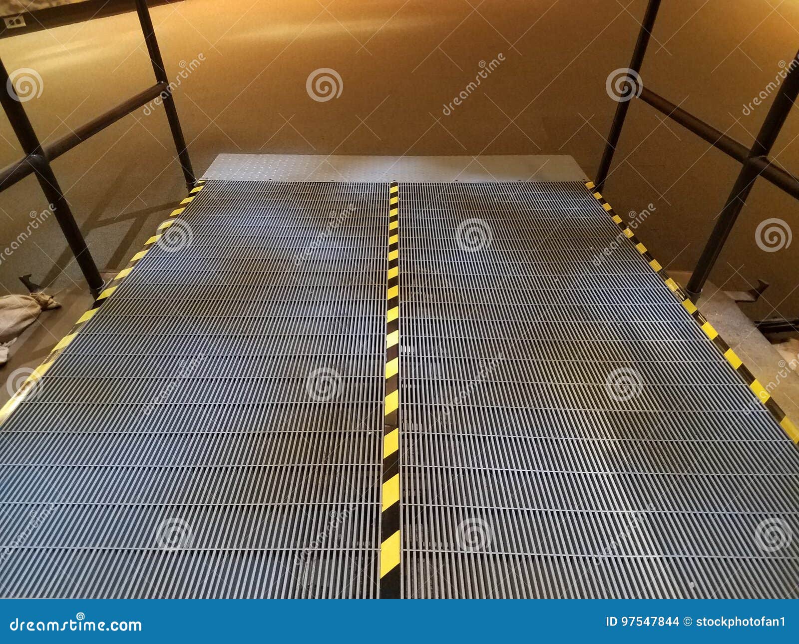 Metal Ramp with Yellow and Black Stripes Stock Photo - Image of railing ...