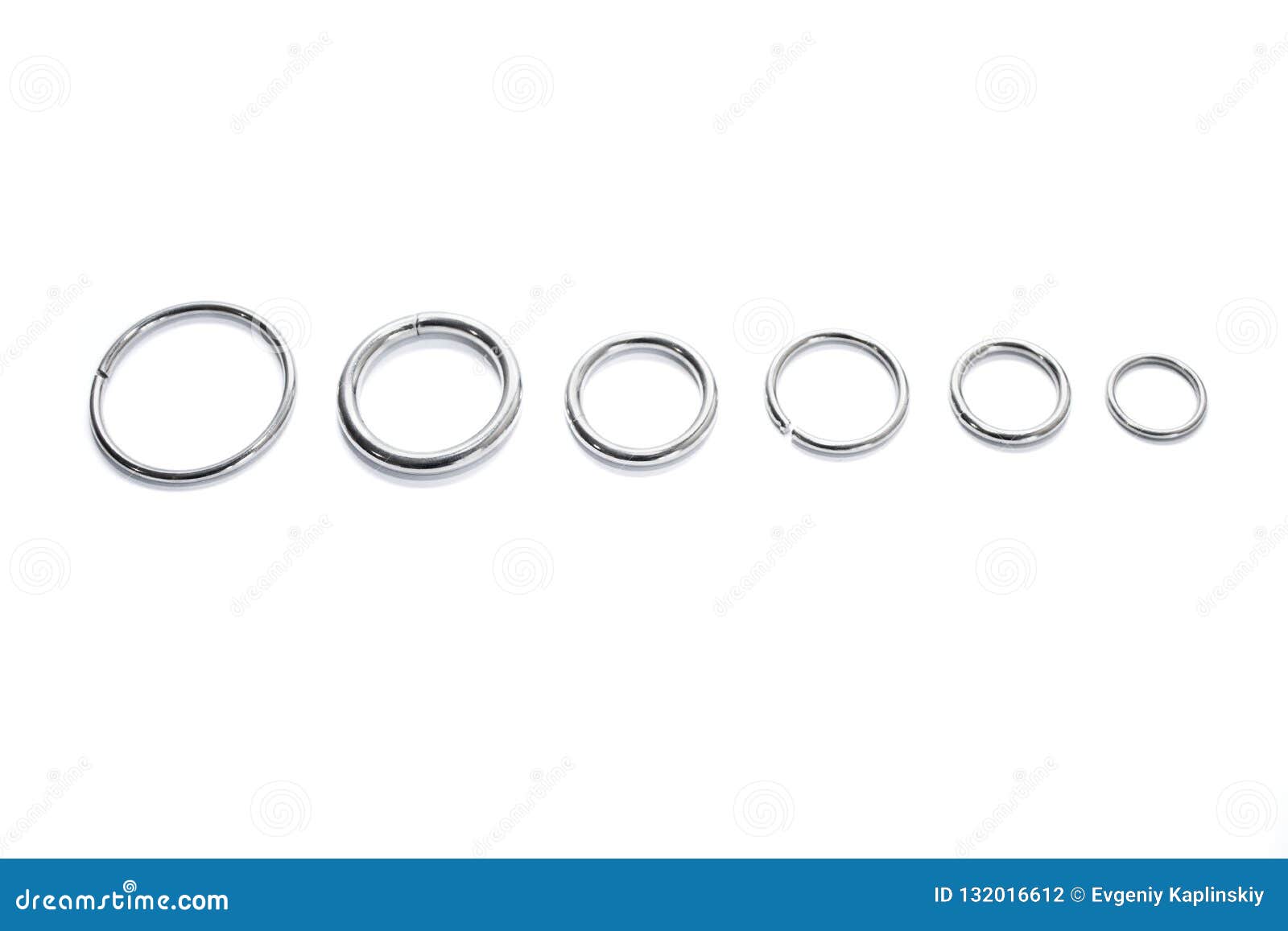 Metal Rings of Different Diameters on a White Background. Stock Photo ...