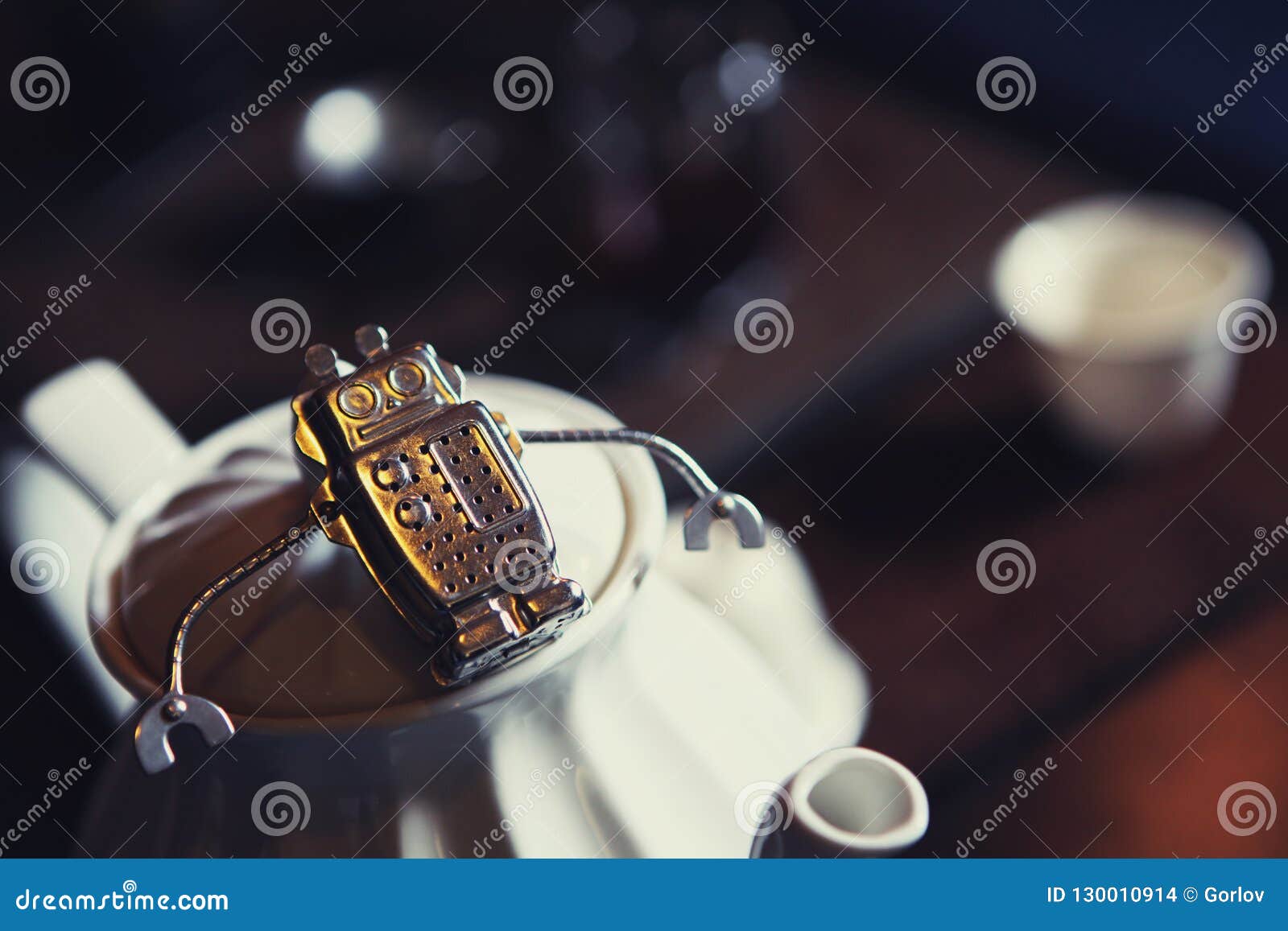 Metal robot tea cup stock photo. Image of energy, futuristic - 130010914