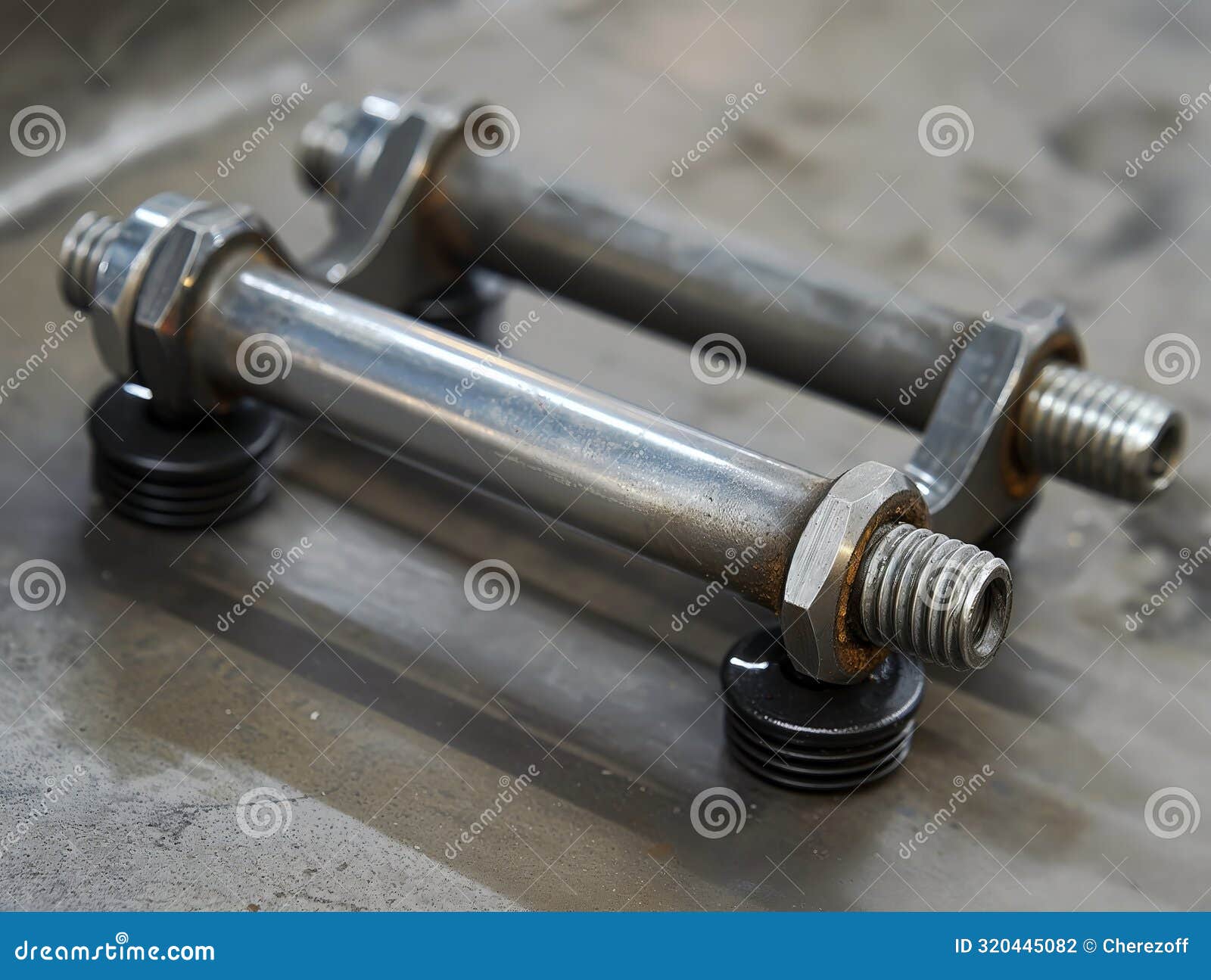 Metal Rods with Nuts and Bolts on a Table Stock Photo - Image of rods ...