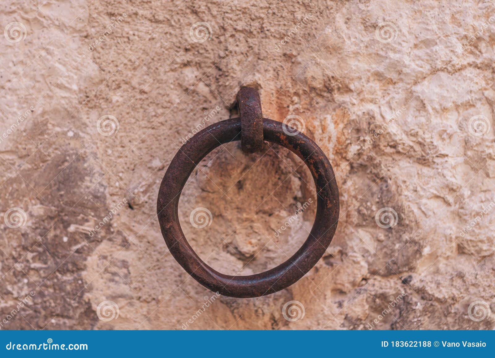 A Metal Rusty Ring is Driven into a Stone Wall Stock Photo - Image of ...