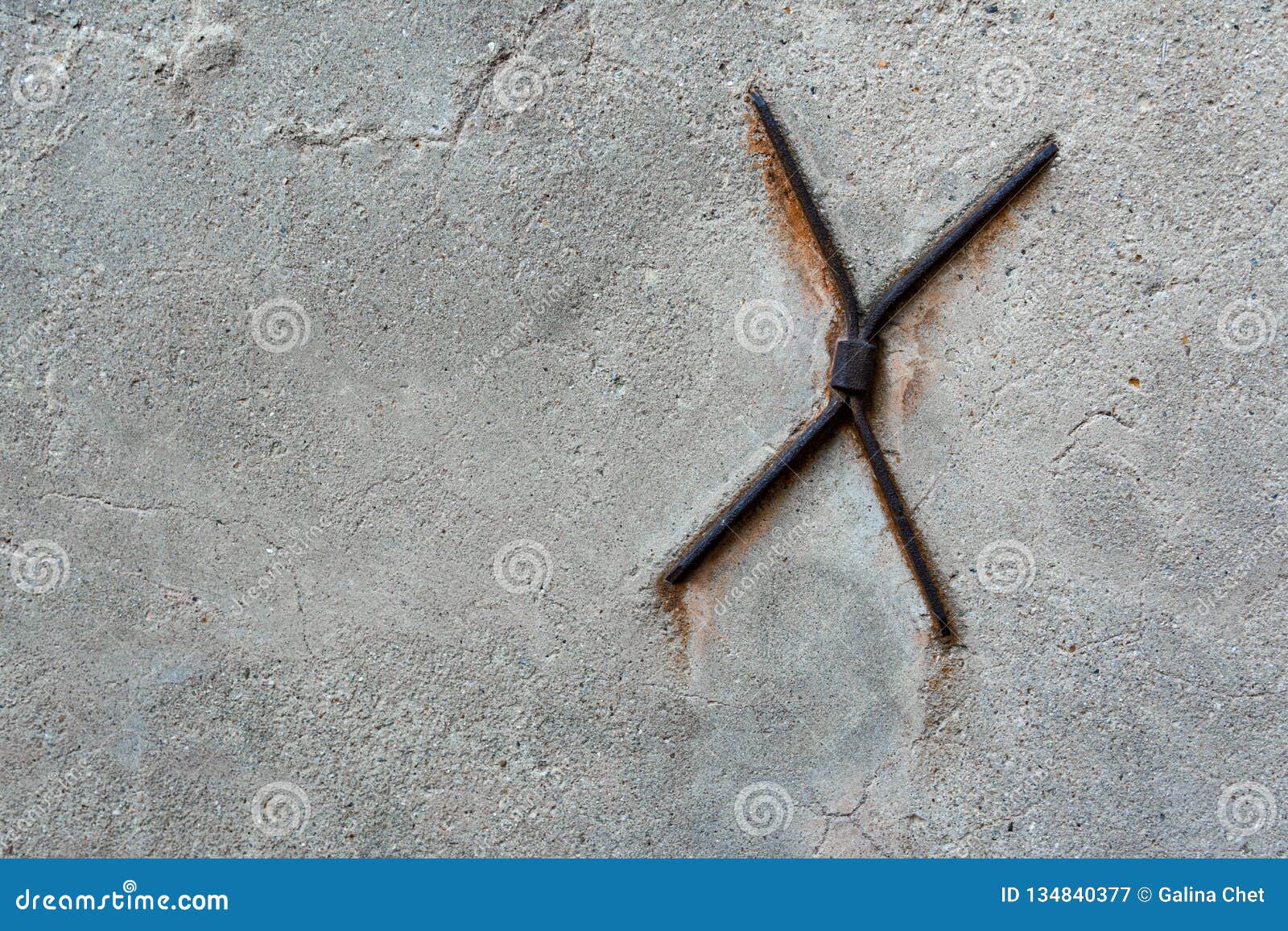 Metal Rusty Rods in the Form of a Cross on a Concrete Wall Stock Image ...
