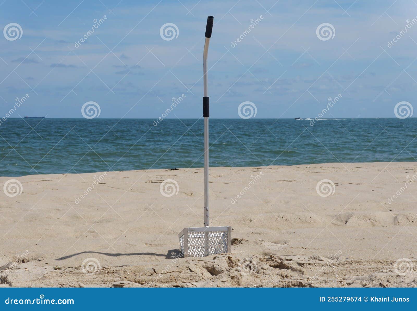 A Metal Sand Fleas Rake by the Beach Stock Photo - Image of beach, bait ...