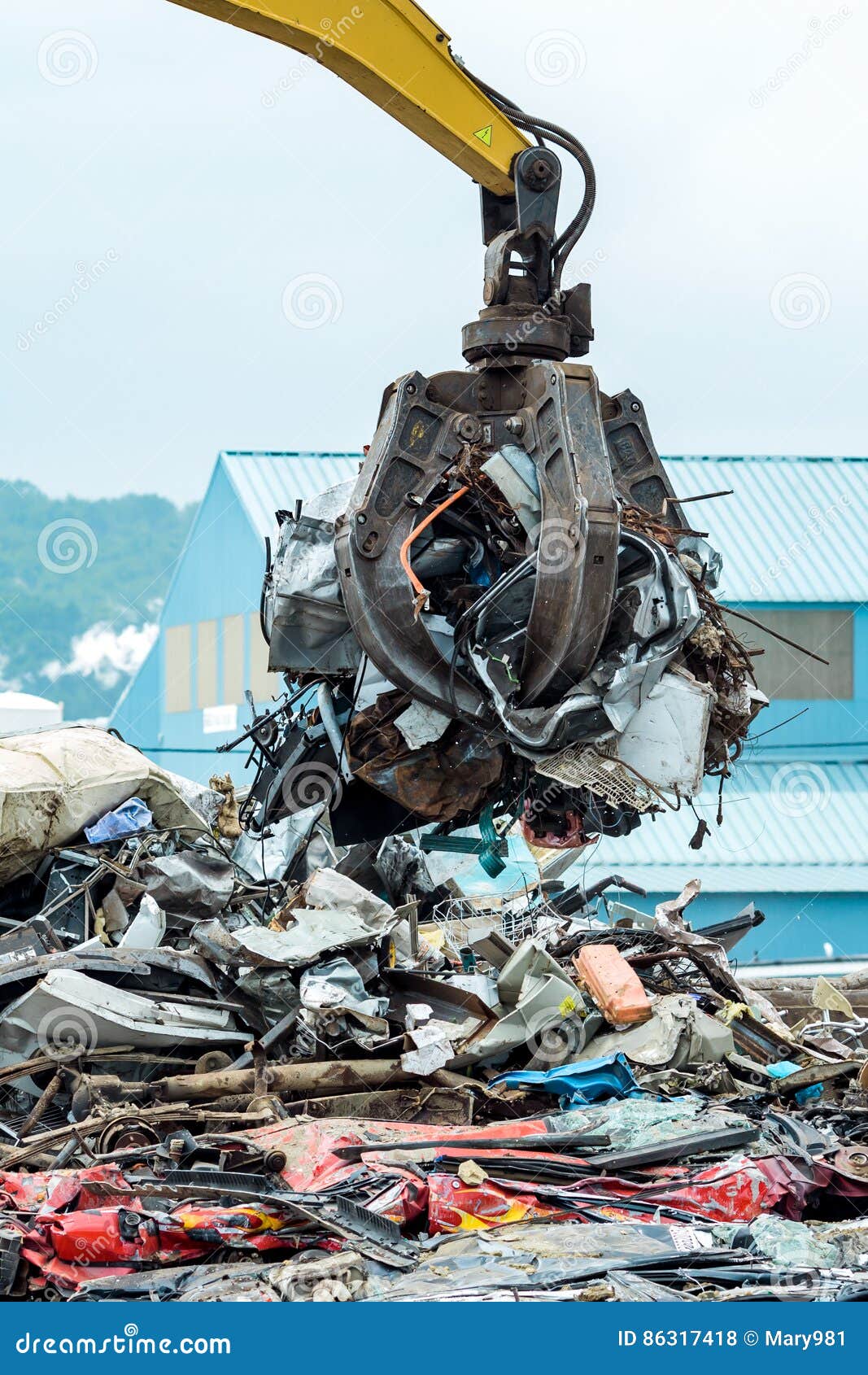 Metal Scrap Yard Crane stock photo. Image of automobile - 86317418