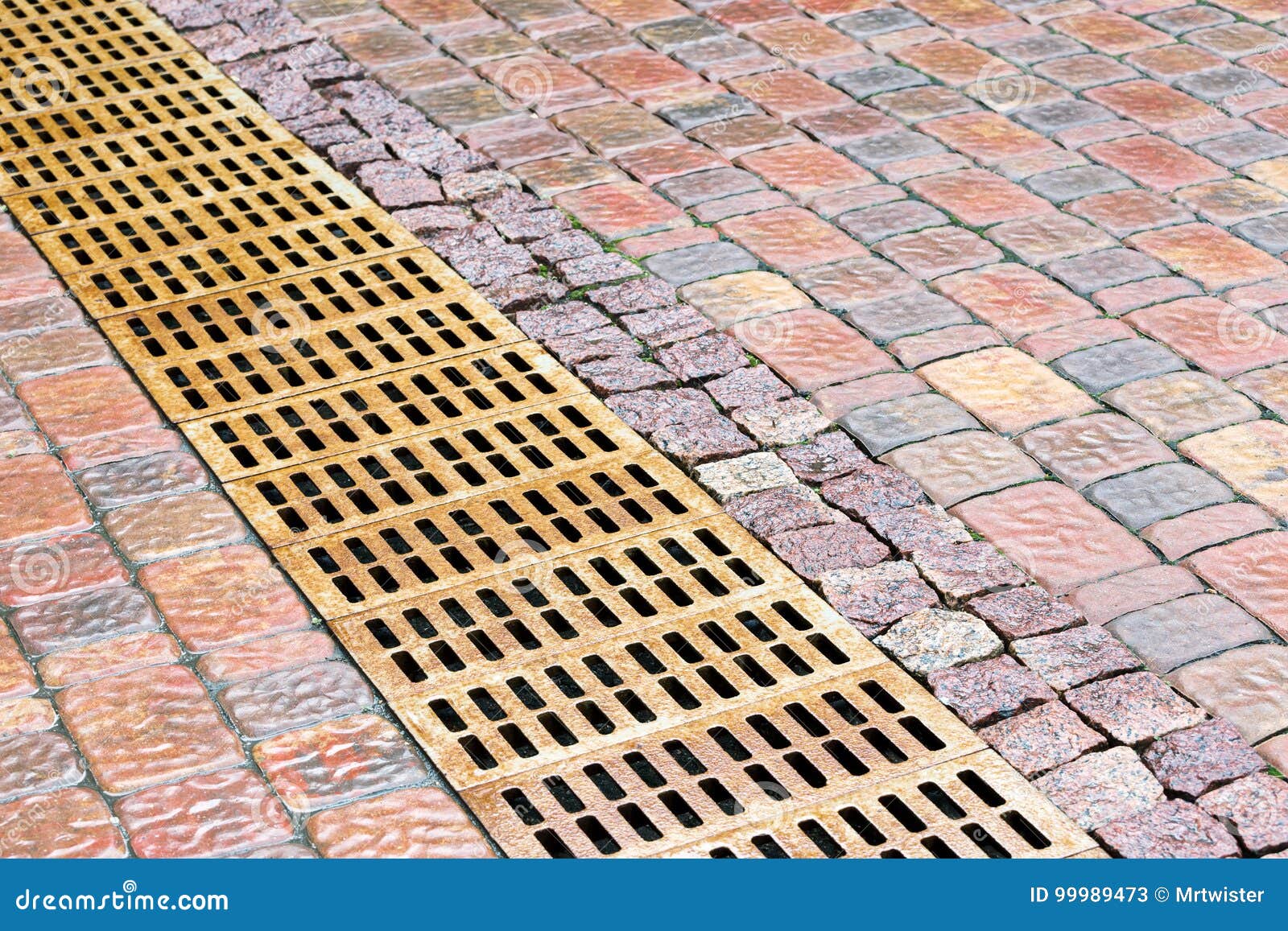 Metal Sewer Hatch On Paving Slabs. Background Royalty-Free Stock ...