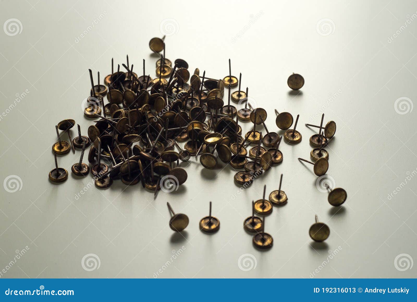 Metal Sharp Buttons Made of Gold-colored Brass on a White Background ...