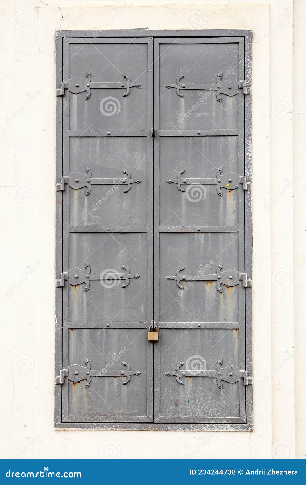 Metal Shutters on a Window with a Padlock Stock Photo - Image of ...