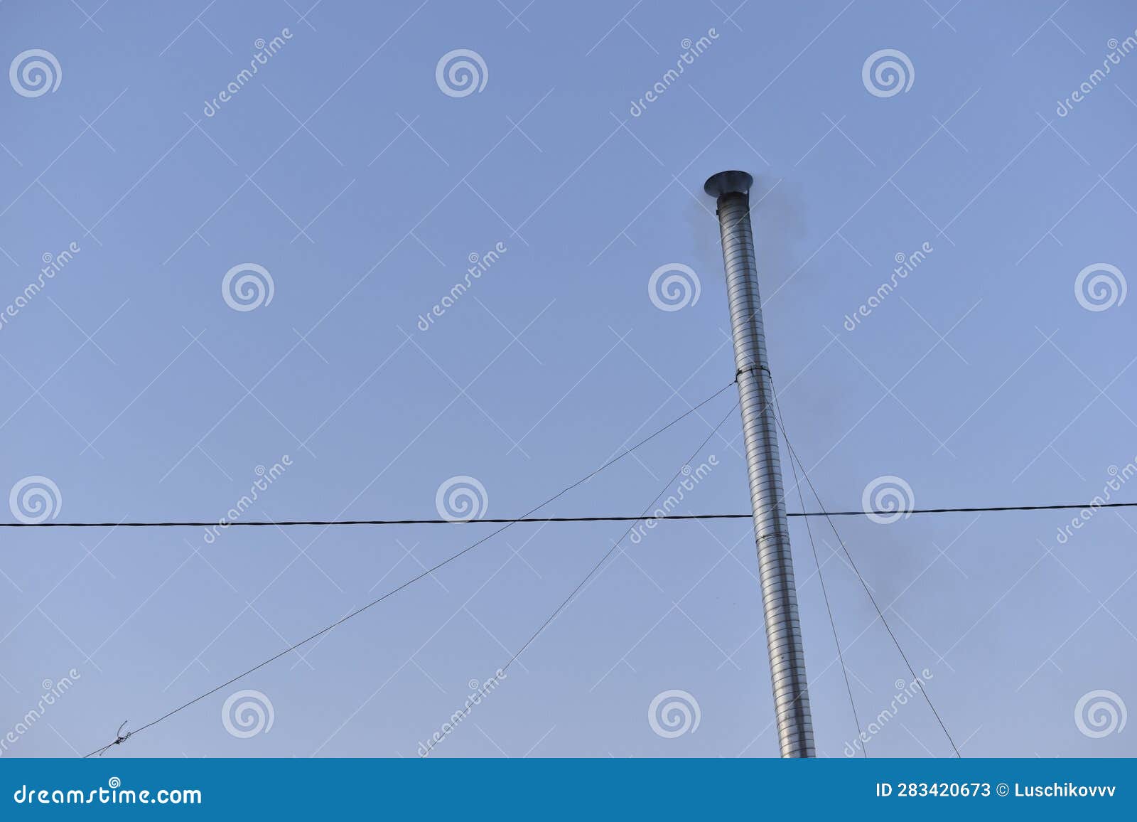 Metal Silver Pipe with Smoke on the Background of the Sky. a Long ...