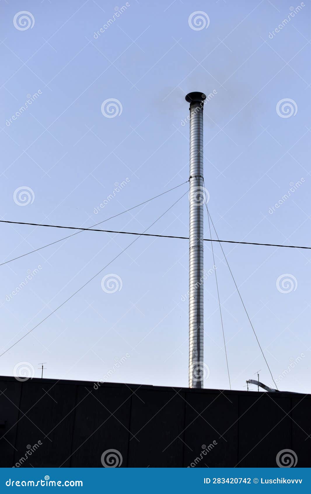 Metal Silver Pipe with Smoke on the Background of the Sky. a Long ...