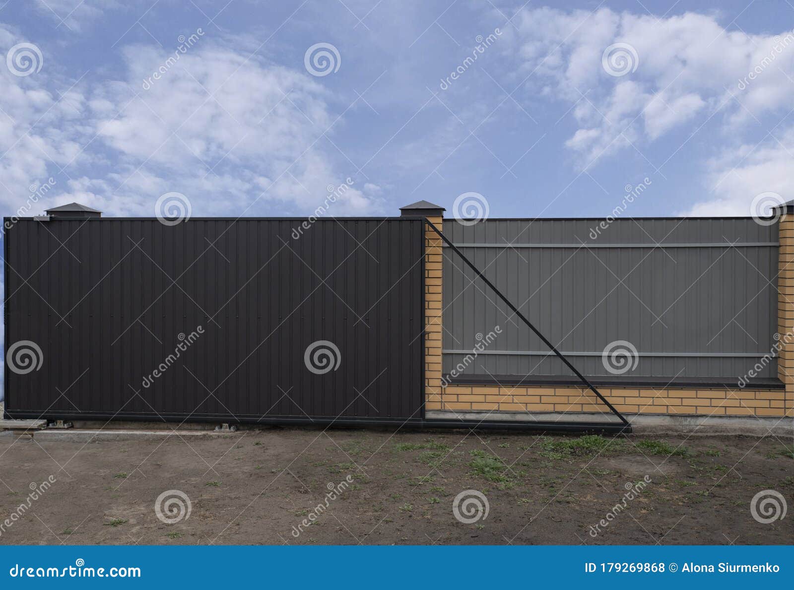 Old Sliding Gates With The Metal Wheels Of An Industrial Warehouse With ...