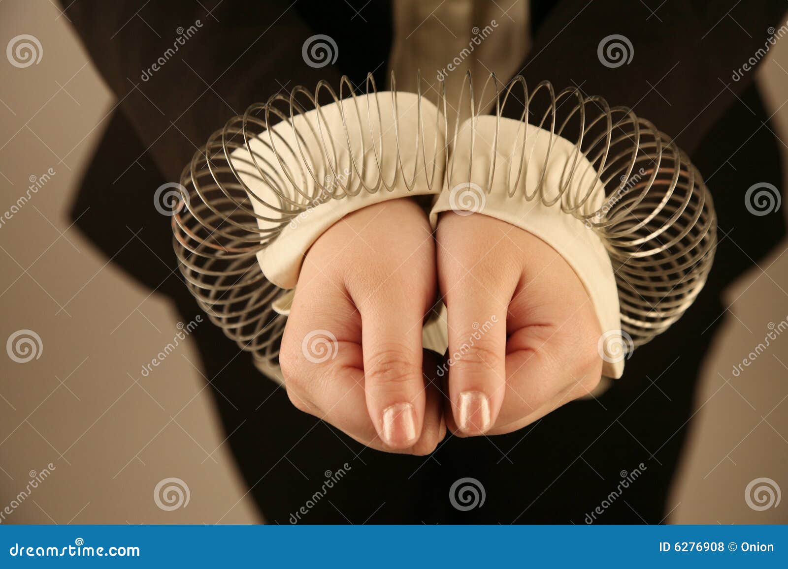 Metal slinky cuffs editorial stock photo. Image of game - 6276908
